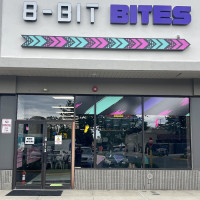 8-Bit Bites - Experience Delicious Burgers and Nostalgic Games